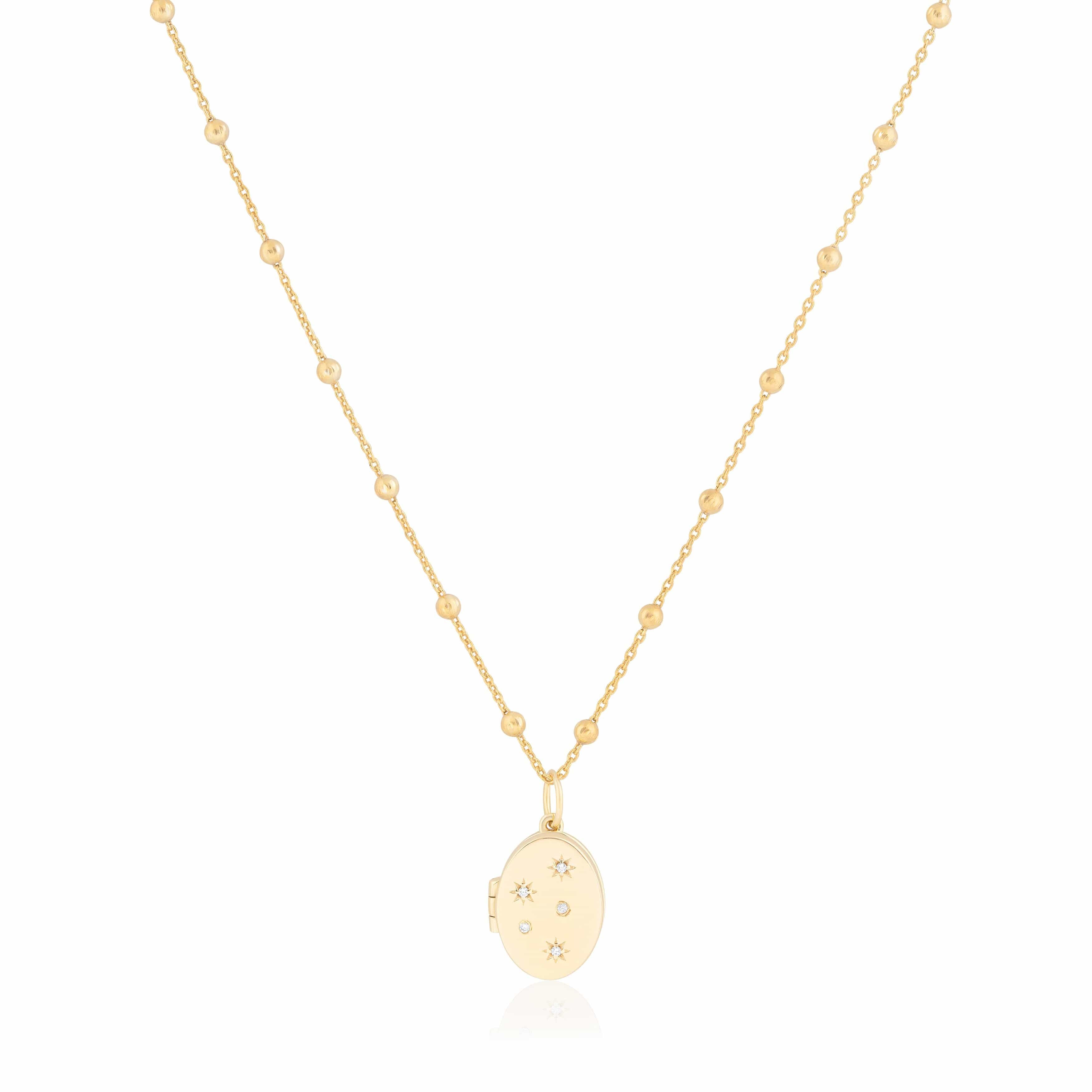 Gold designer locket store